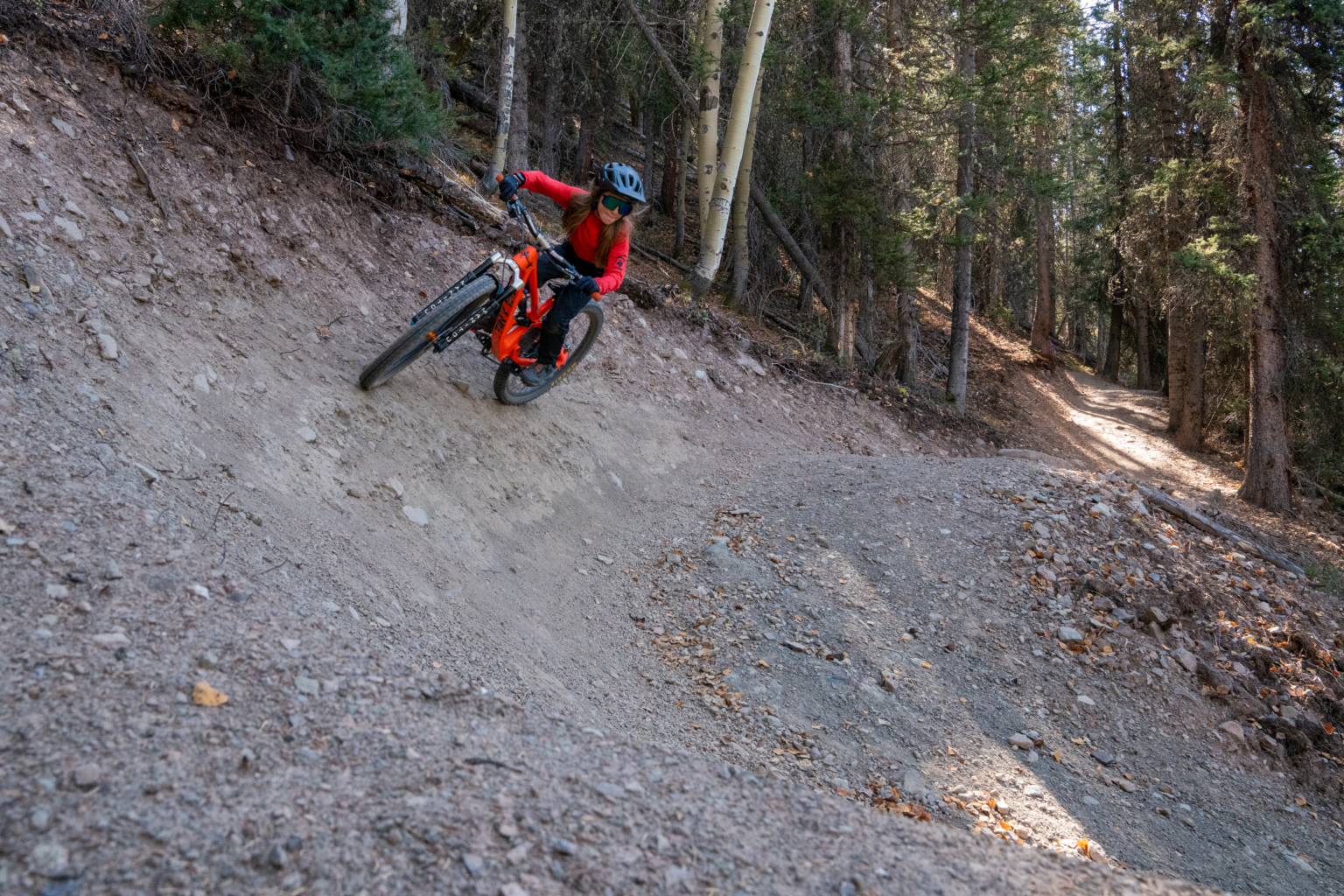 Machine-built downhill flow trails in the high mountains of Colorado ...