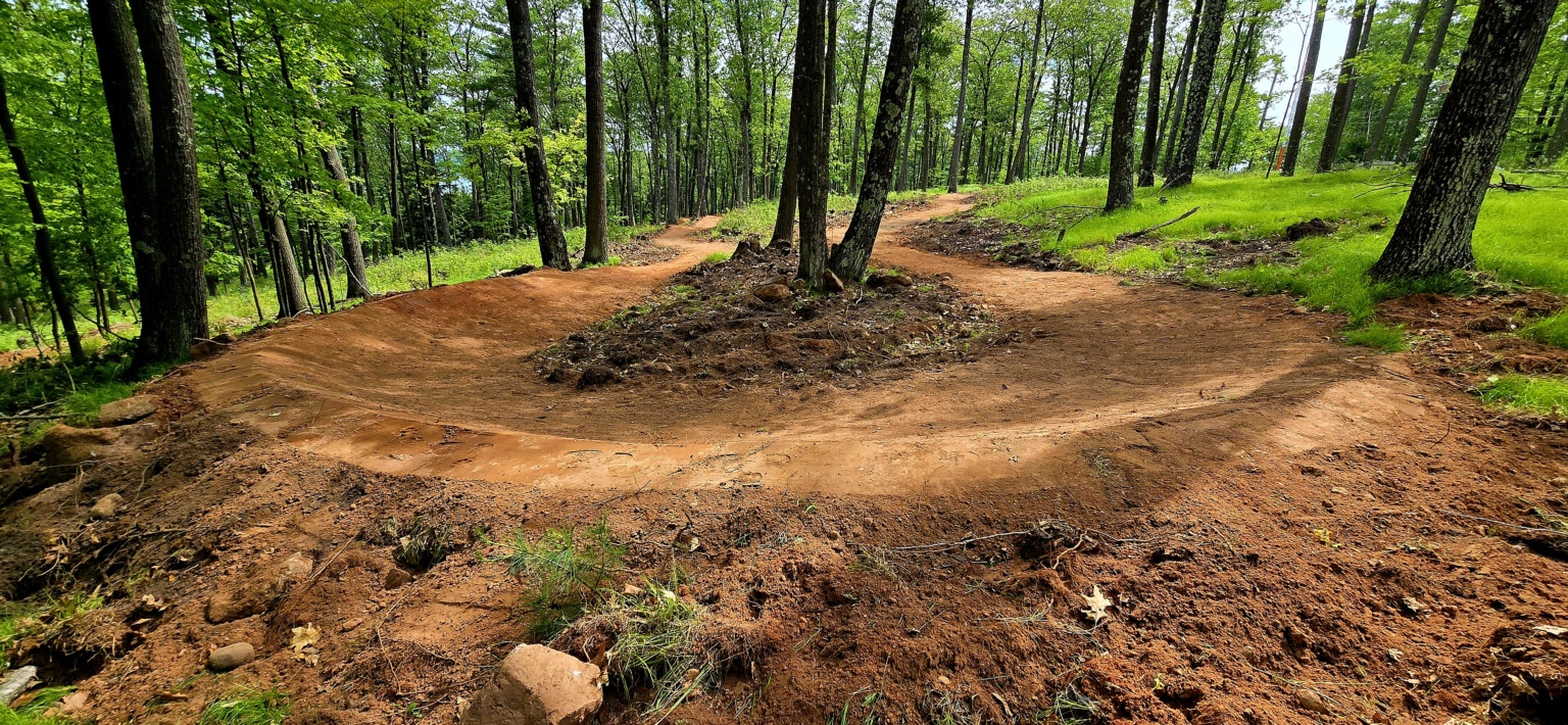 A new MTB trail system in Iron Mountain, MI, features a speed boat in a ...